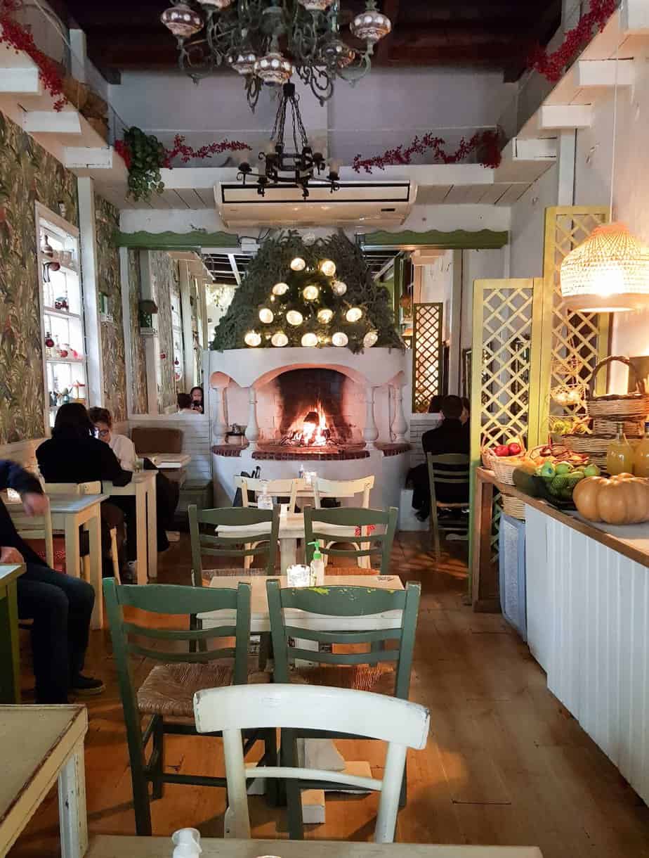 On the steps of Yiasemi Cafe Athens - sweet-streets